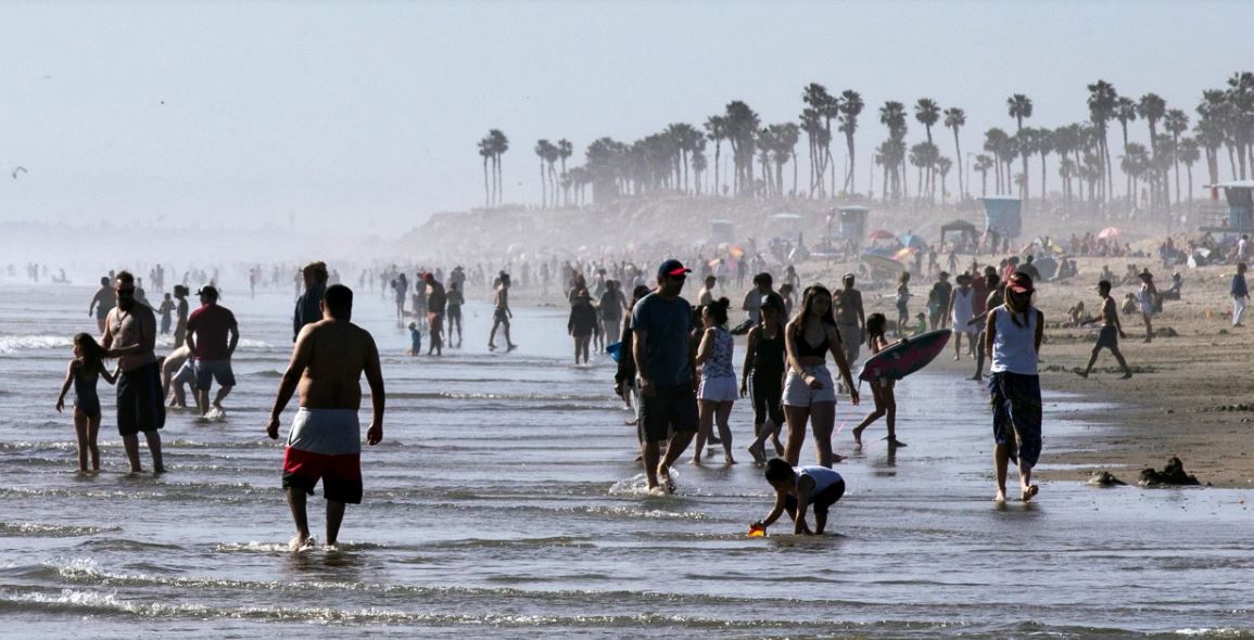 busy beach - Travel Off Path