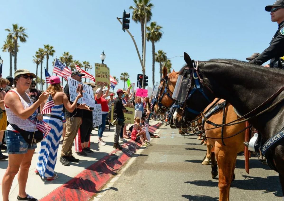 Protestors Swarm California Beach As County Records Highest Single Day ...