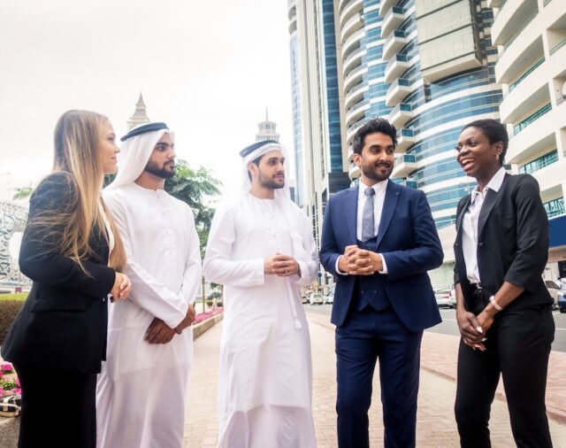 Multi-ethnic group of people on a business meeting in the UAE - Travel ...
