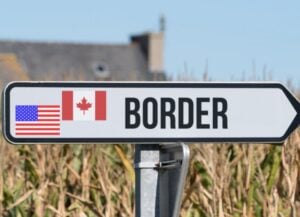 us-canada-border-sign - Travel Off Path