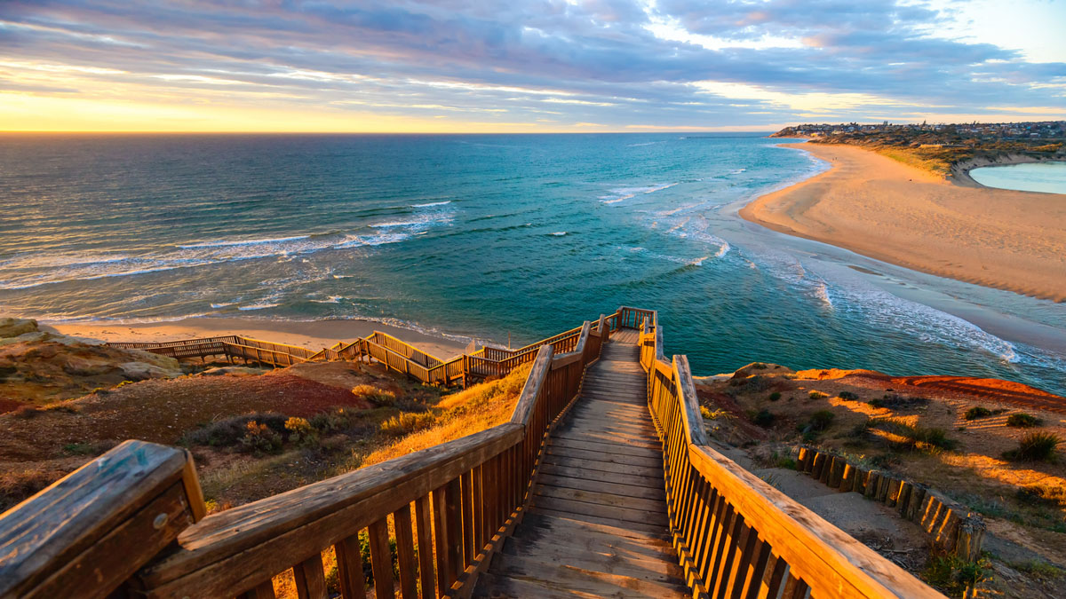 South Port Beach boardwalk at sunset - Travel Off Path