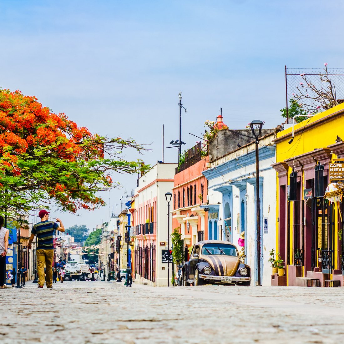 Oaxaca, Mexico - Street with Colorful colonial buildings in th eold ...