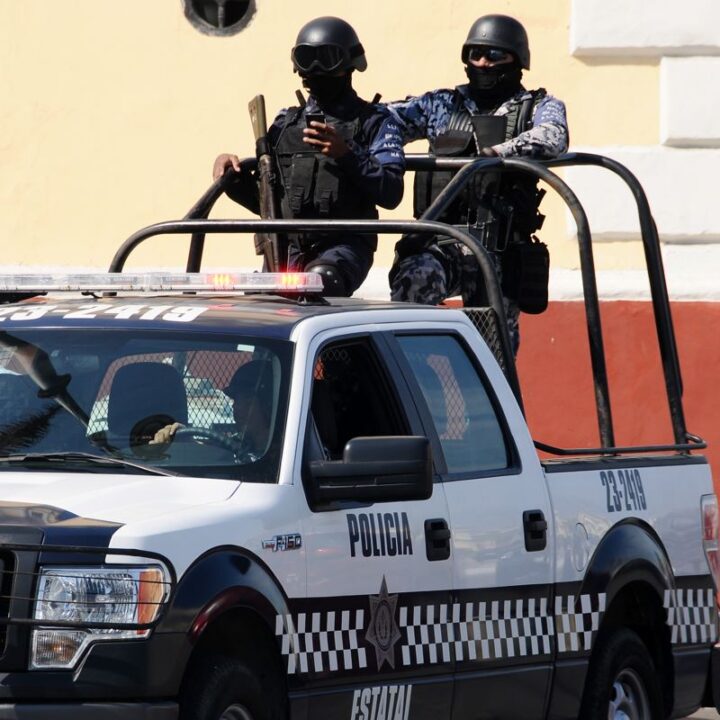 Mexico police patrolling in truck - Travel Off Path