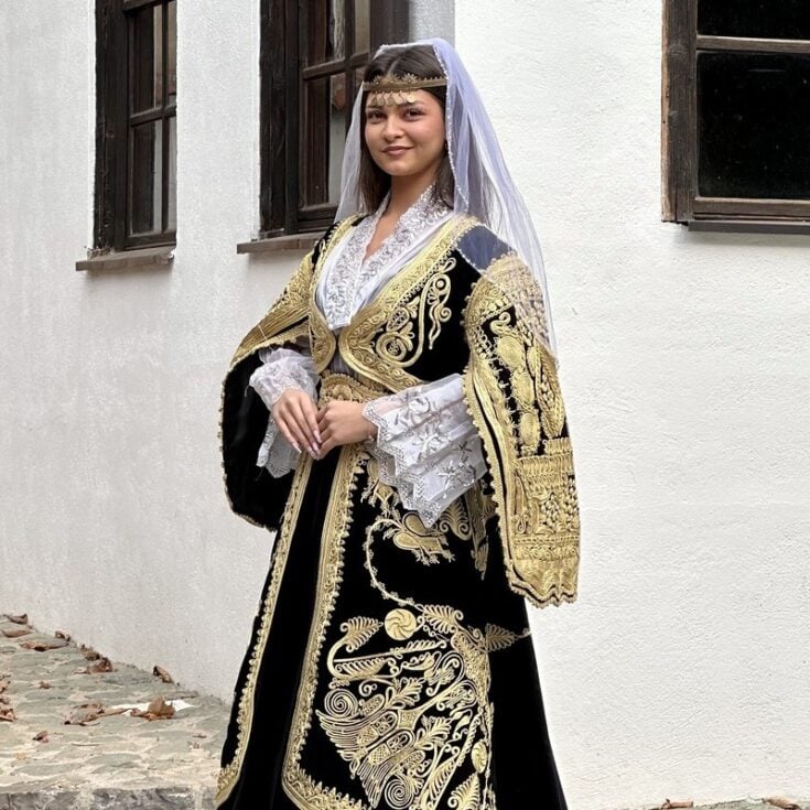 Kosovar Albanian Girl Smiling At The Camera As She Wears Traditional ...