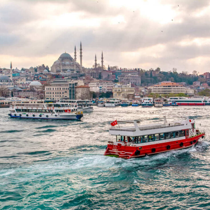 Boats And Passenger Ferries Crossing The Bosphorus Strait Facing The ...