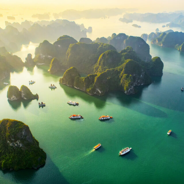 Aerial-view-floating-fishing-village-and-rock-island-Halong-Bay-Vietnam ...