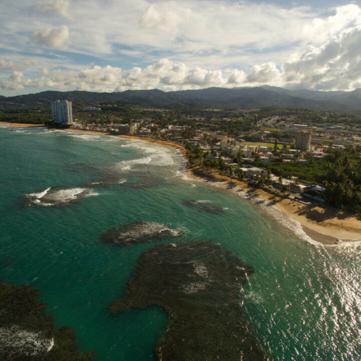 Aerial-view-over-the-Caribbean-Playa-Azul-beach - Travel Off Path