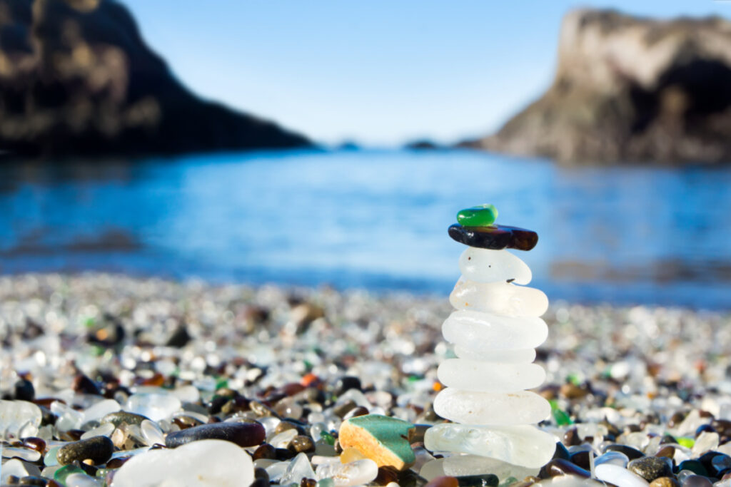 Pyramid of polished sea glass on a Glass Beach - Travel Off Path
