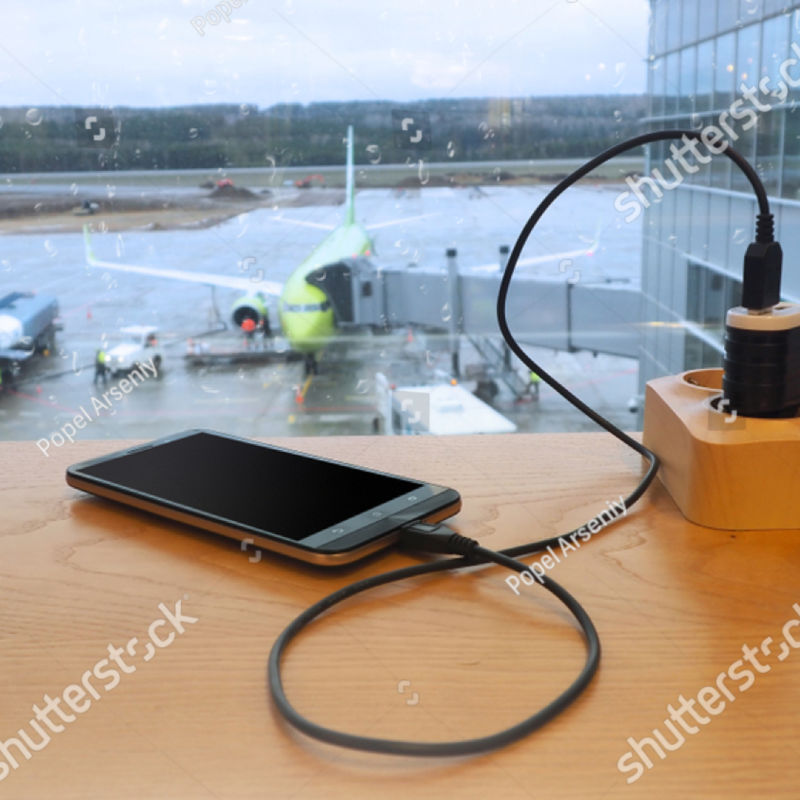 phone charging at airport - Travel Off Path