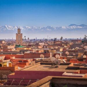 Panoramic View Of The Marrakech Skyline With The Roofs Of The Red ...