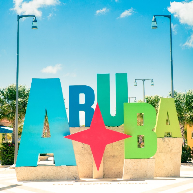 The "Aruba: One Happy Island" Sign - Travel Off Path