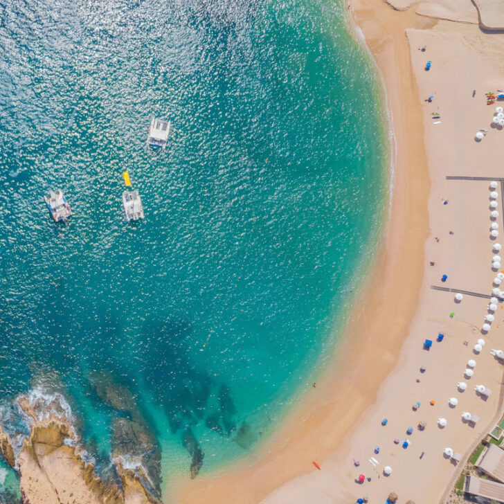 aerial-view-of-crystal-blue-waters-of-los-cabos - Travel Off Path