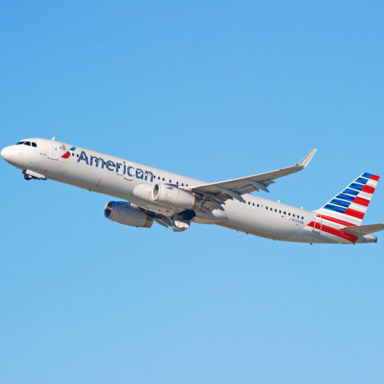 American-Airlines-plane-in-blue-sky - Travel Off Path