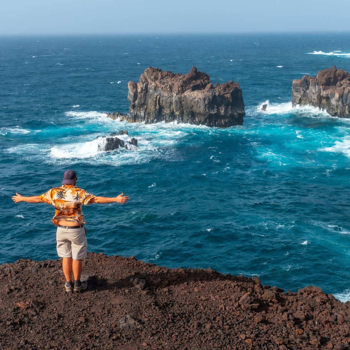 Young Man Taking A Picture At A Cliff In El Hierro, Canary Islands ...