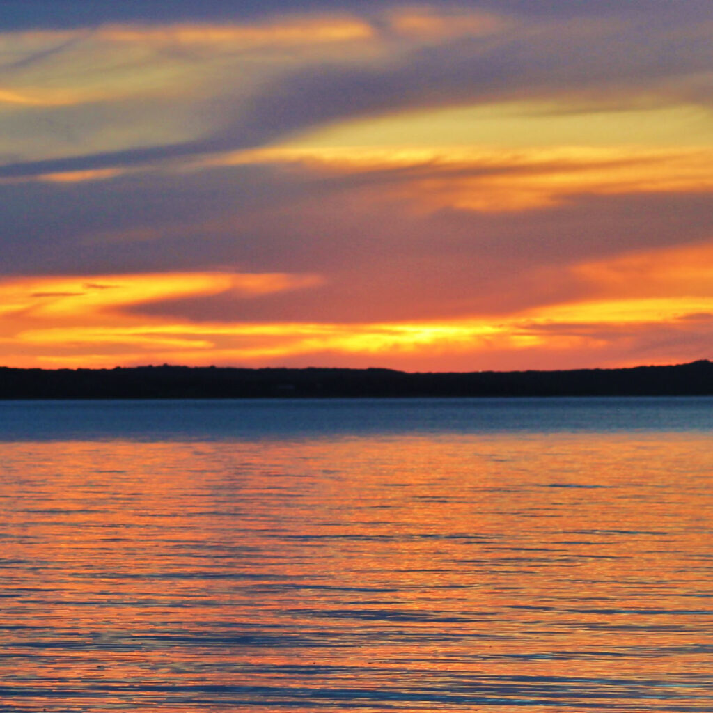 Fiery sunset over Lake Texoma - Travel Off Path