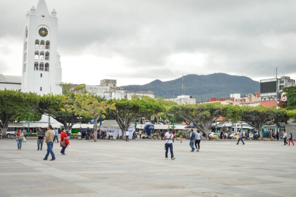 Locals wandering main square of Tuxtla Gutierrez, MX - Travel Off Path